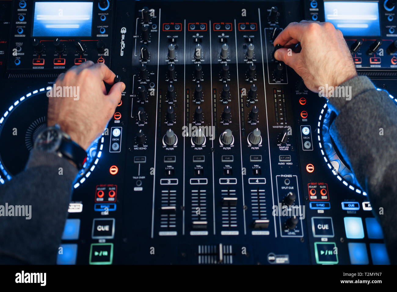 Sound operator hands over the remote control panel in the recording ...