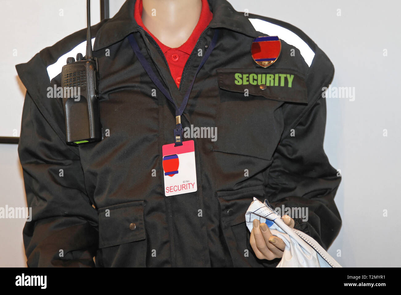Security Guard Uniform With Badge ID and Radio Stock Photo - Alamy