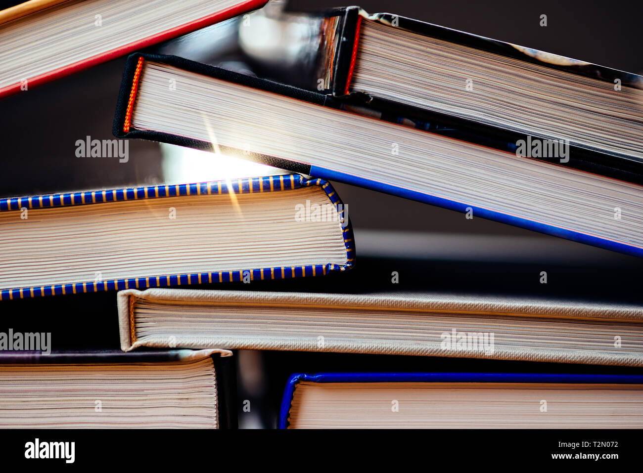 Many books piled on a stack Stock Photo - Alamy