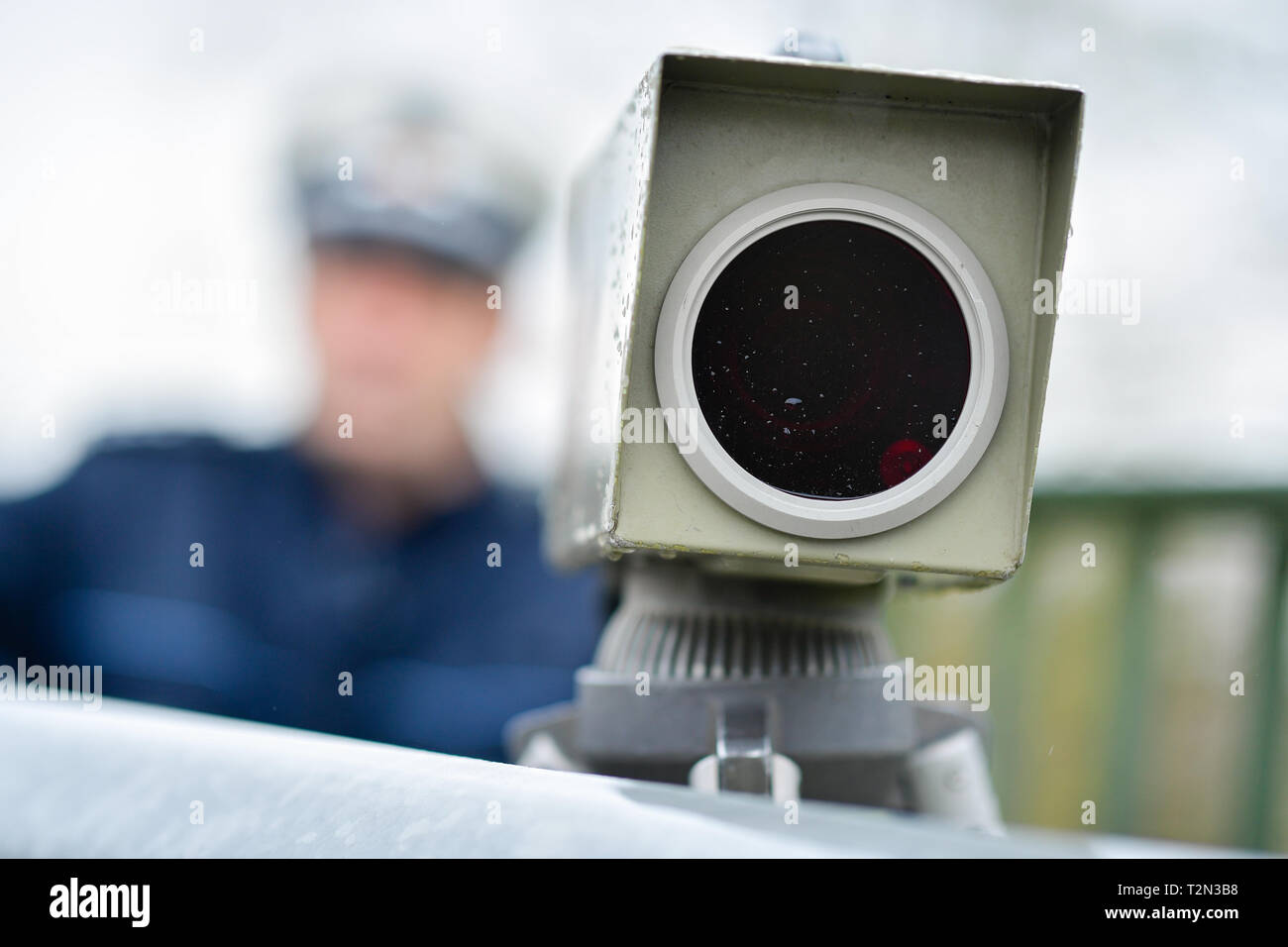 Sinsheim, Germany. 03rd Apr, 2019. A police officer stands behind a ...
