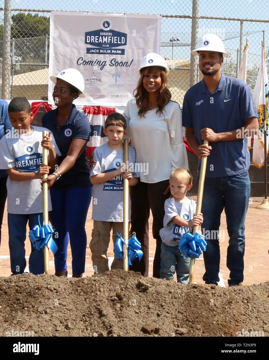 Officials, Holly Robinson Peete, RJ Peete, children in attendance for ...