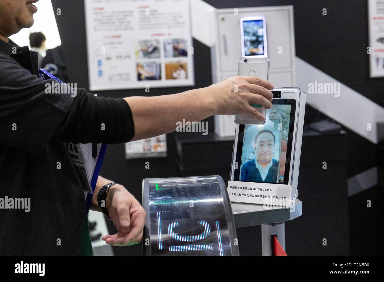 Tokyo, Japan. 03rd Apr, 2019. An exhibitor demonstrates facial ...