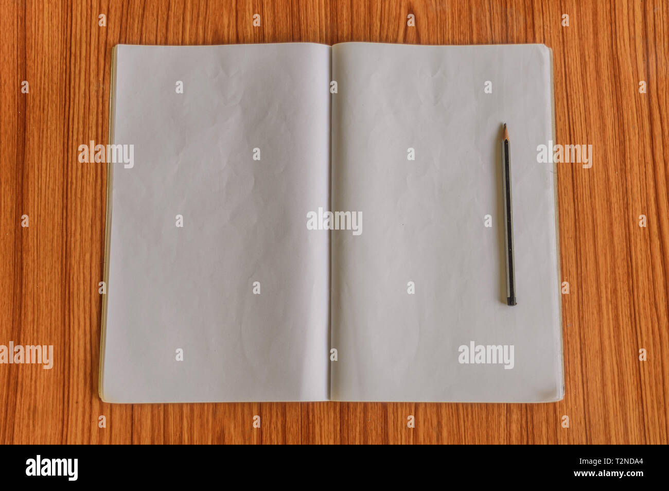Notebooks and pencil isolated on wooden table hardwood floor. Ready to ...