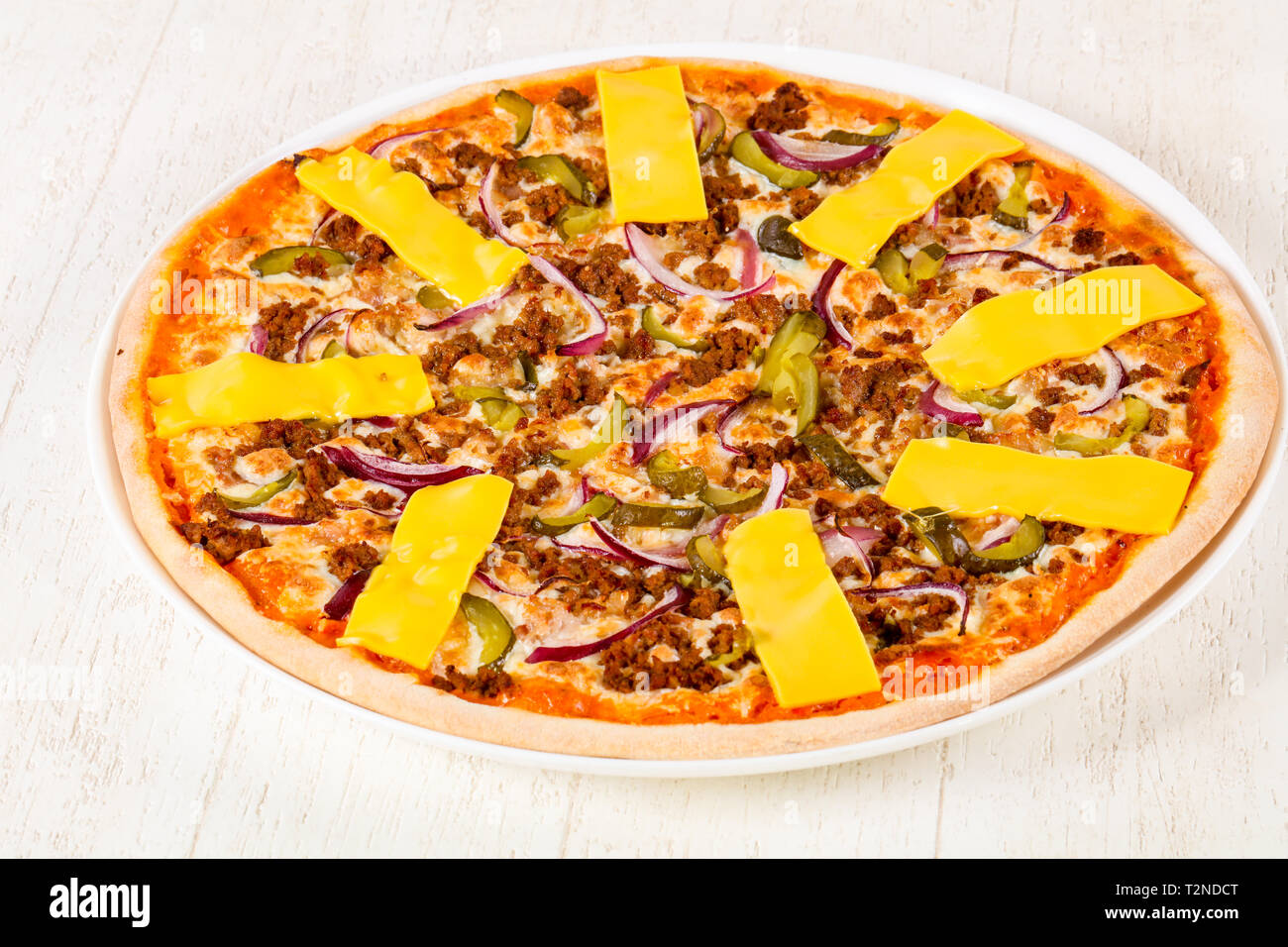 Pizza with minced meat and cheese Stock Photo - Alamy