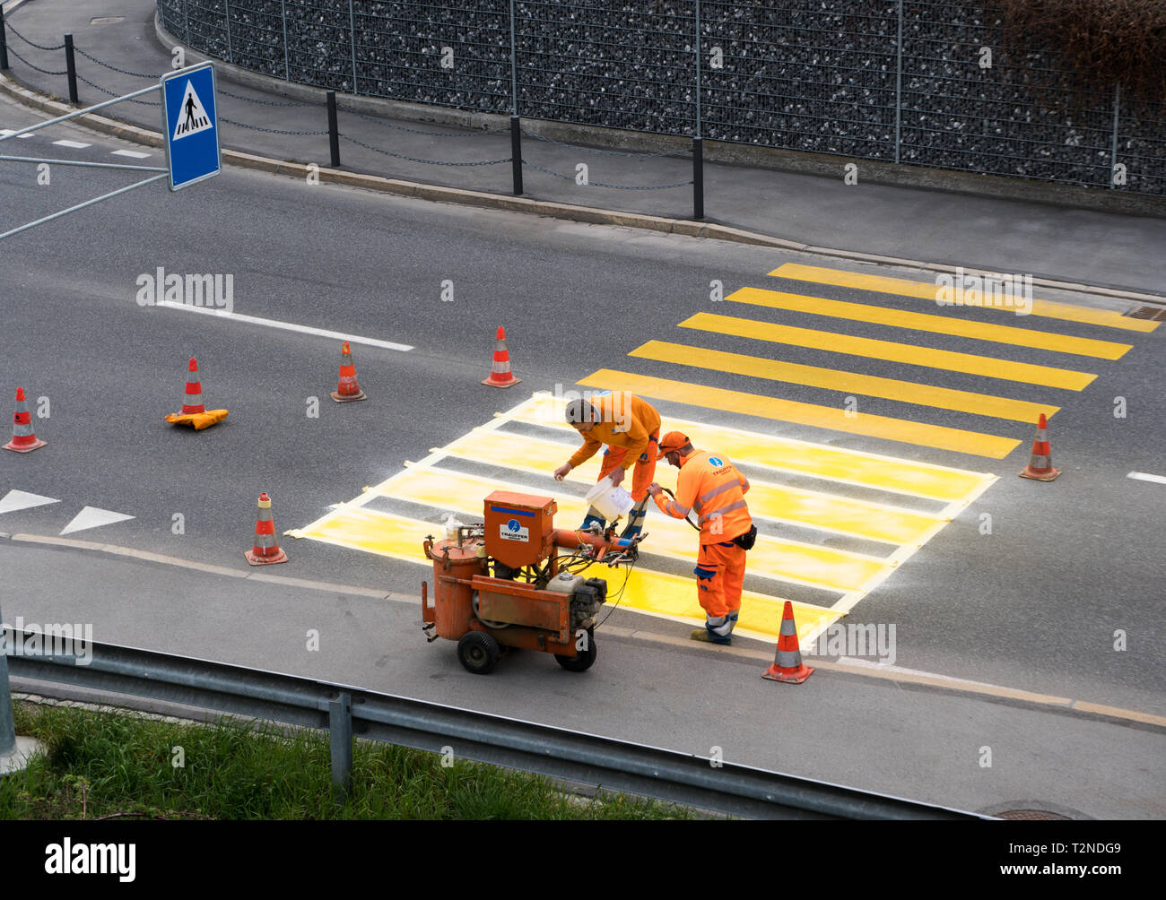 Orange pedestrian crossing sign hi-res stock photography and images - Alamy