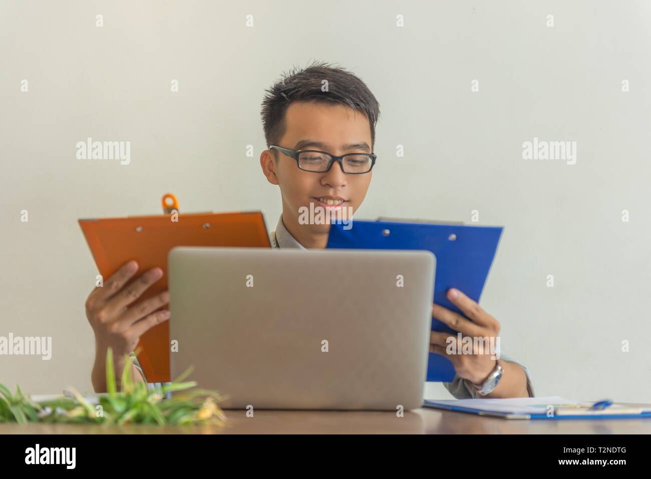 Office man checking financial hi-res stock photography and images - Alamy