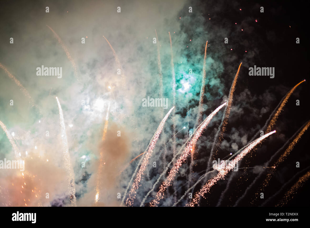Explosive and colorful holiday fireworks at night sky. Celebration City ...