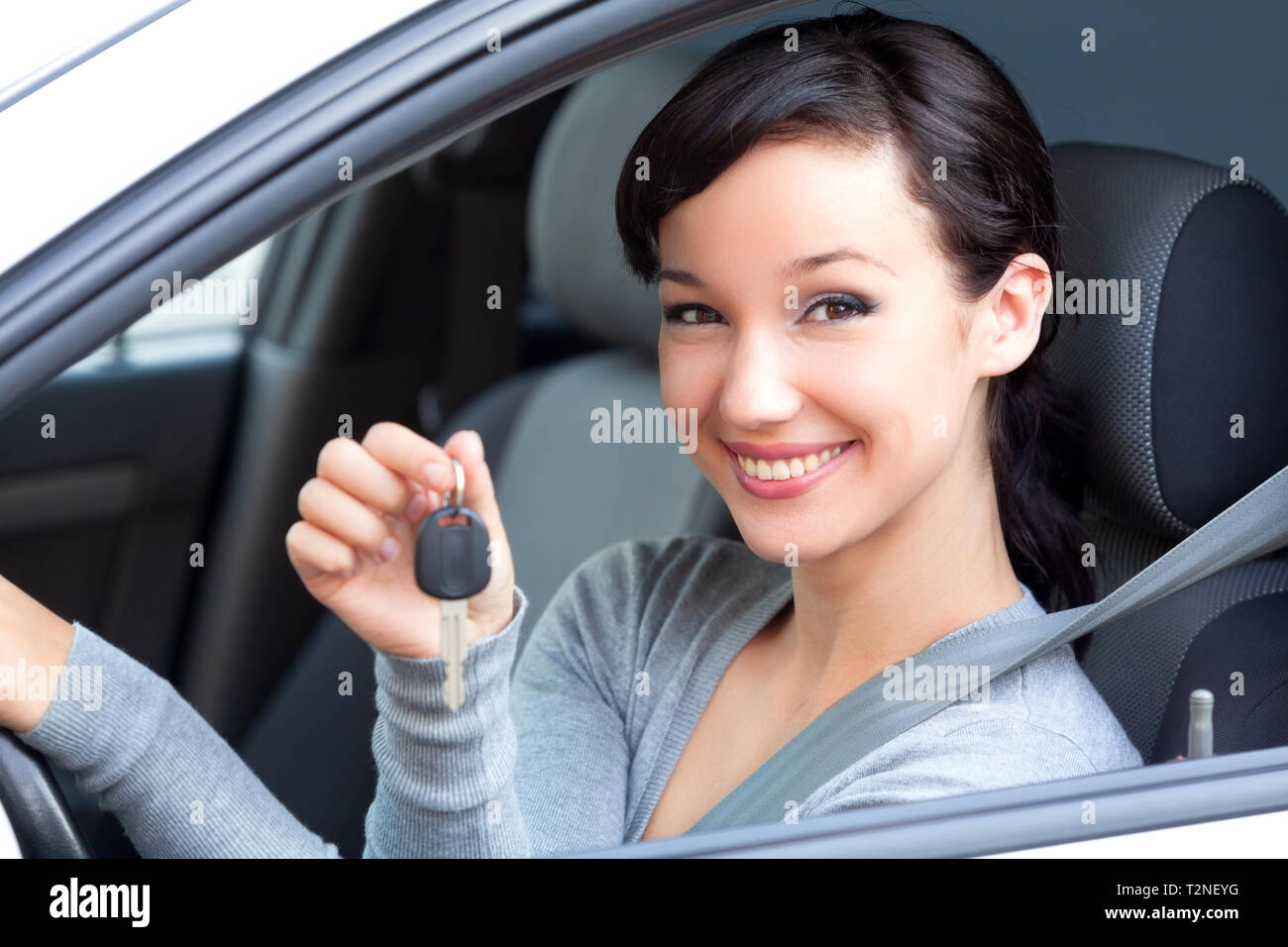 Young happy woman driver hold car keys in her new car Stock Photo - Alamy