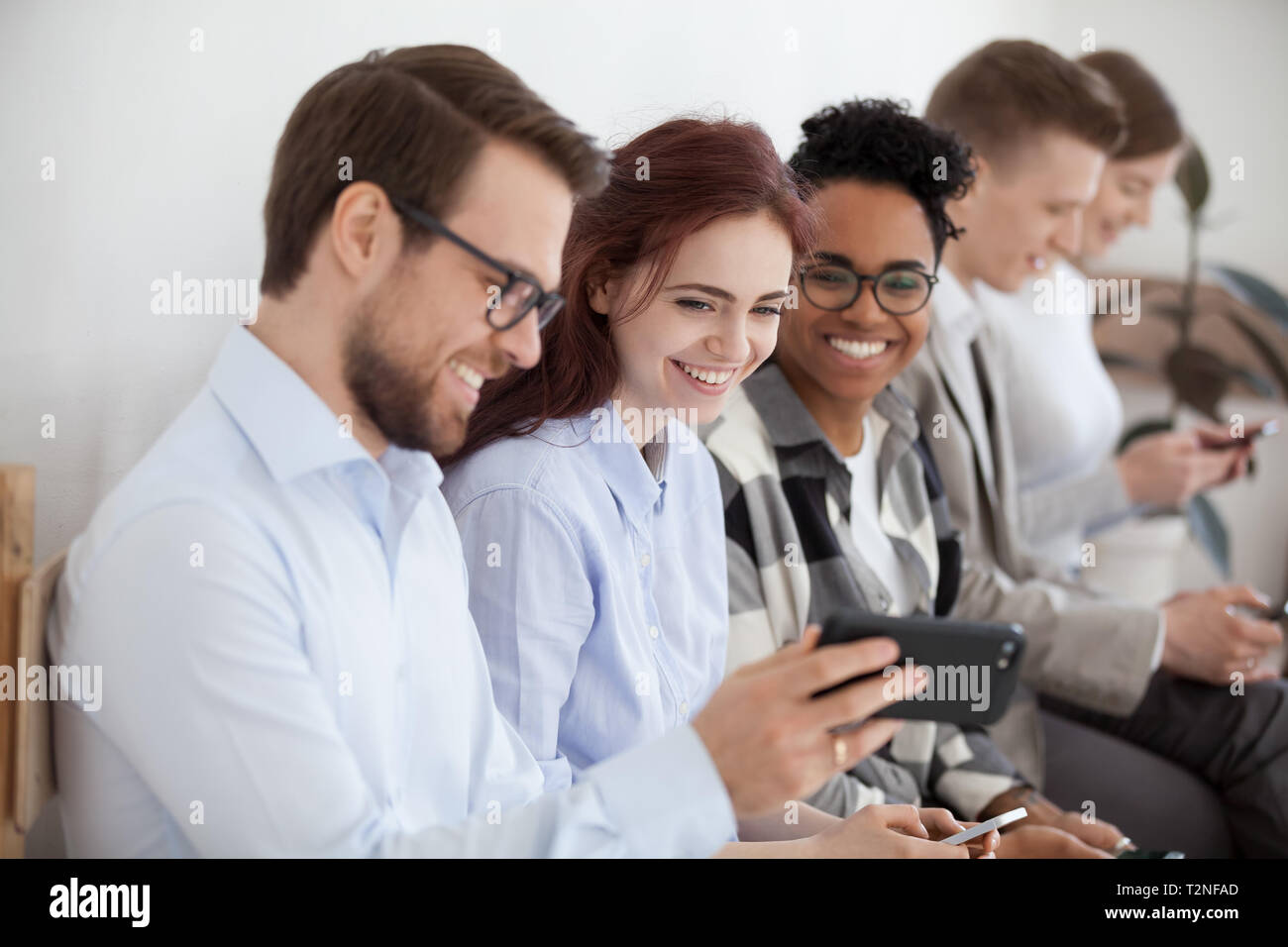 Young people job interview phones hi-res stock photography and images ...