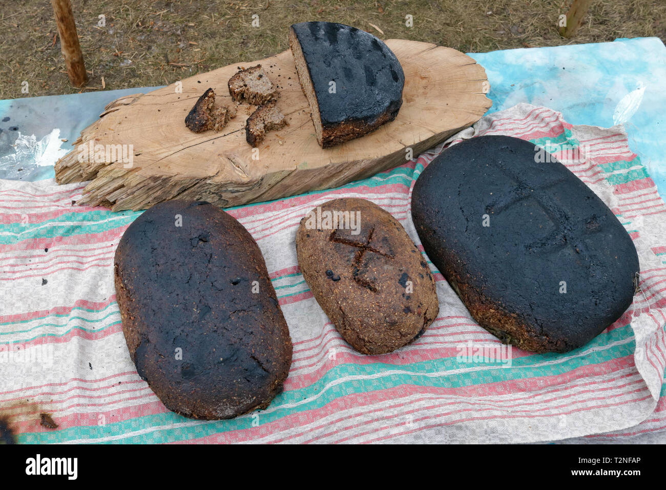 Large pieces of solid Lithuanian rustic rough rye black bread are sold ...