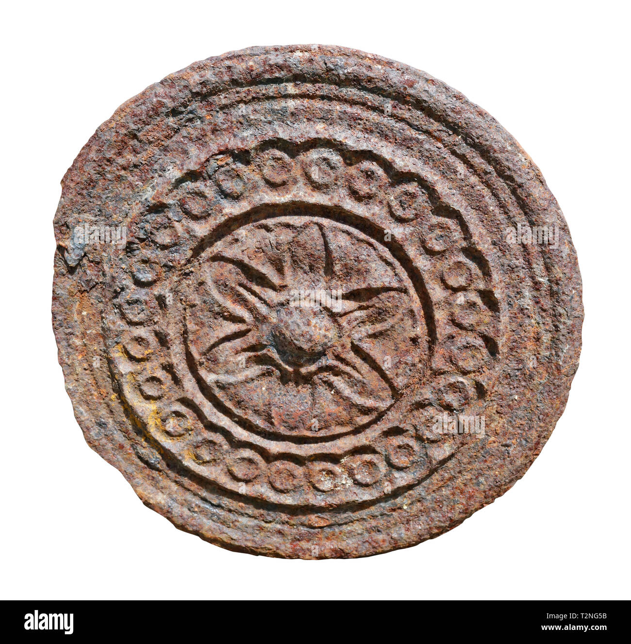 Rusty aged round sun symbol from iron. Isolated with patch outdoor ...