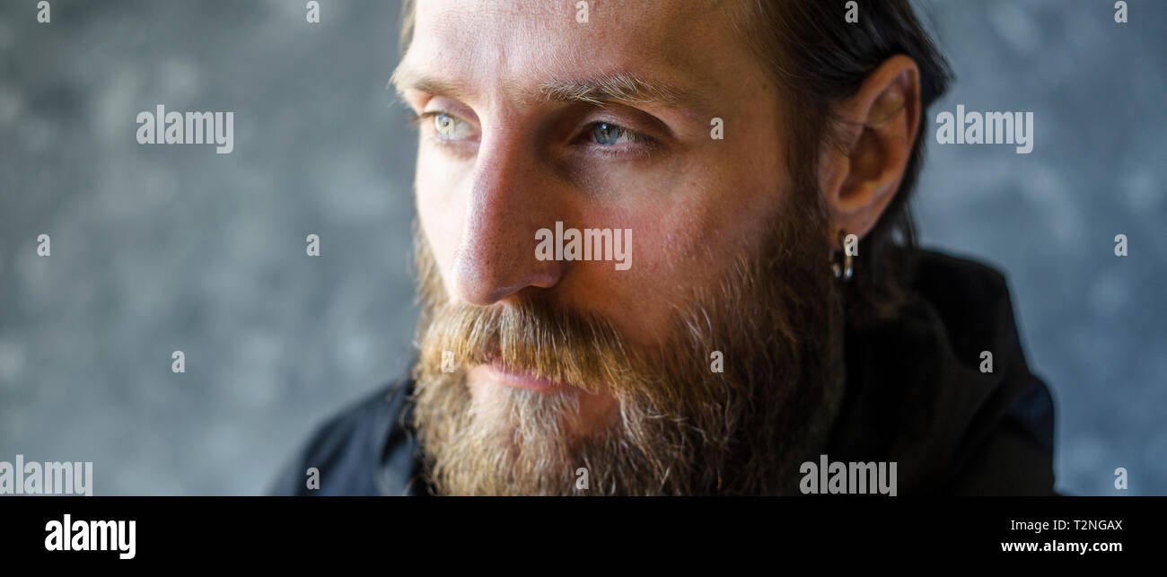 Portrait of a Serious Sad Man with a Beard. Cinematic Crop. Thinkness ...