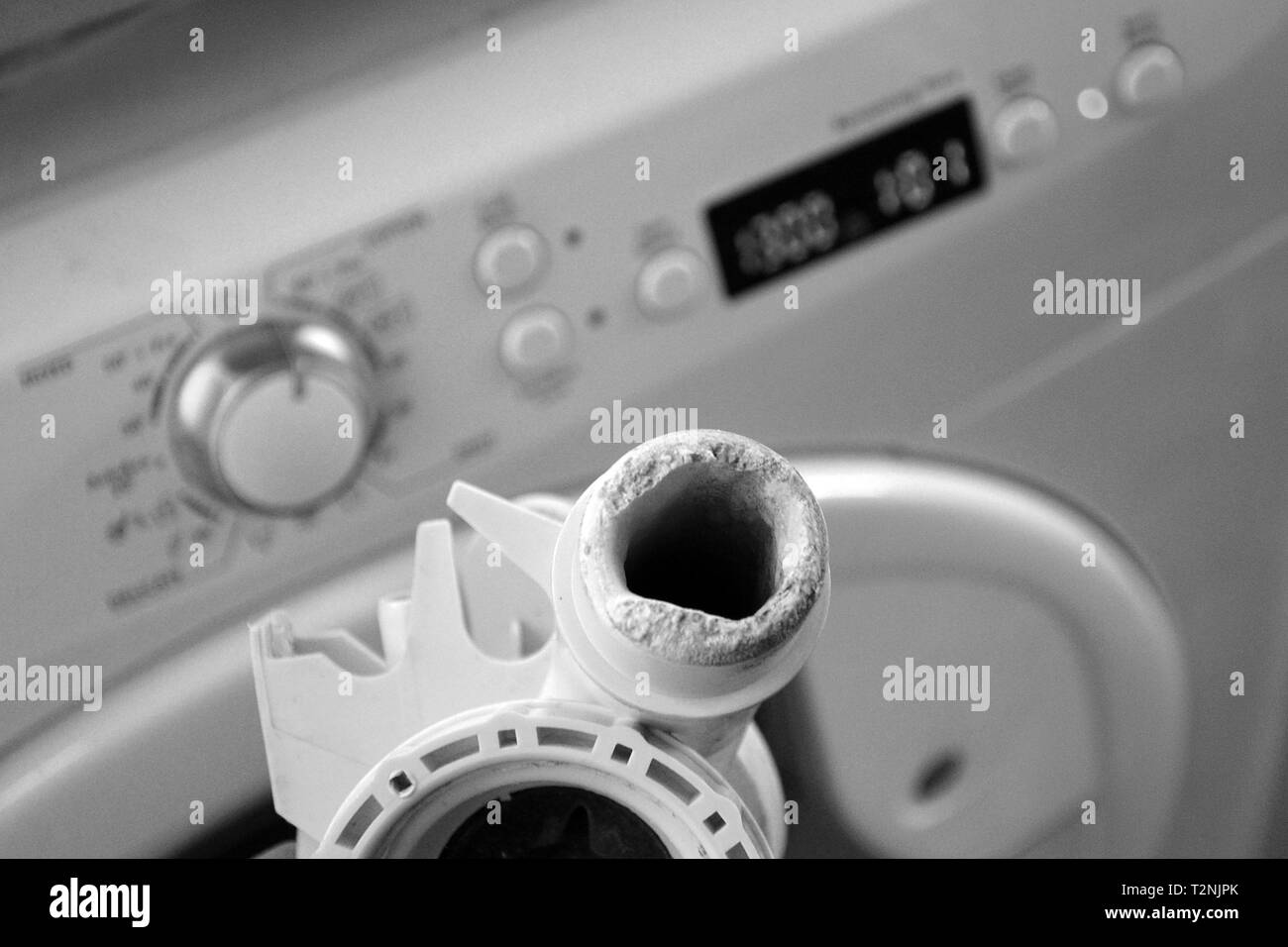 limescale build up in washing machine Stock Photo - Alamy