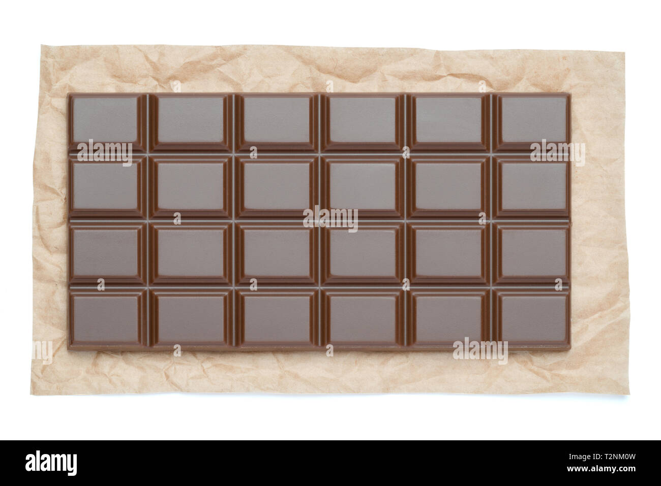 milk chocolate bar on craft packaging paper isolated on white ...