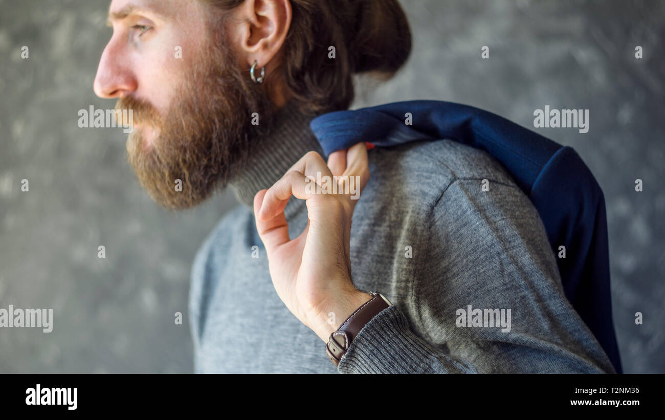 Man with jacket hanging over shoulder hi-res stock photography and ...