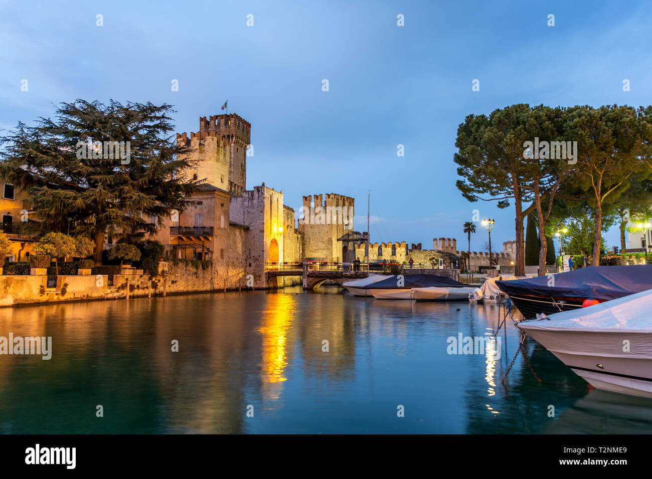Rocca Scaligera Castle at sunset in Sirmione, Garda Lake, Italy Stock ...