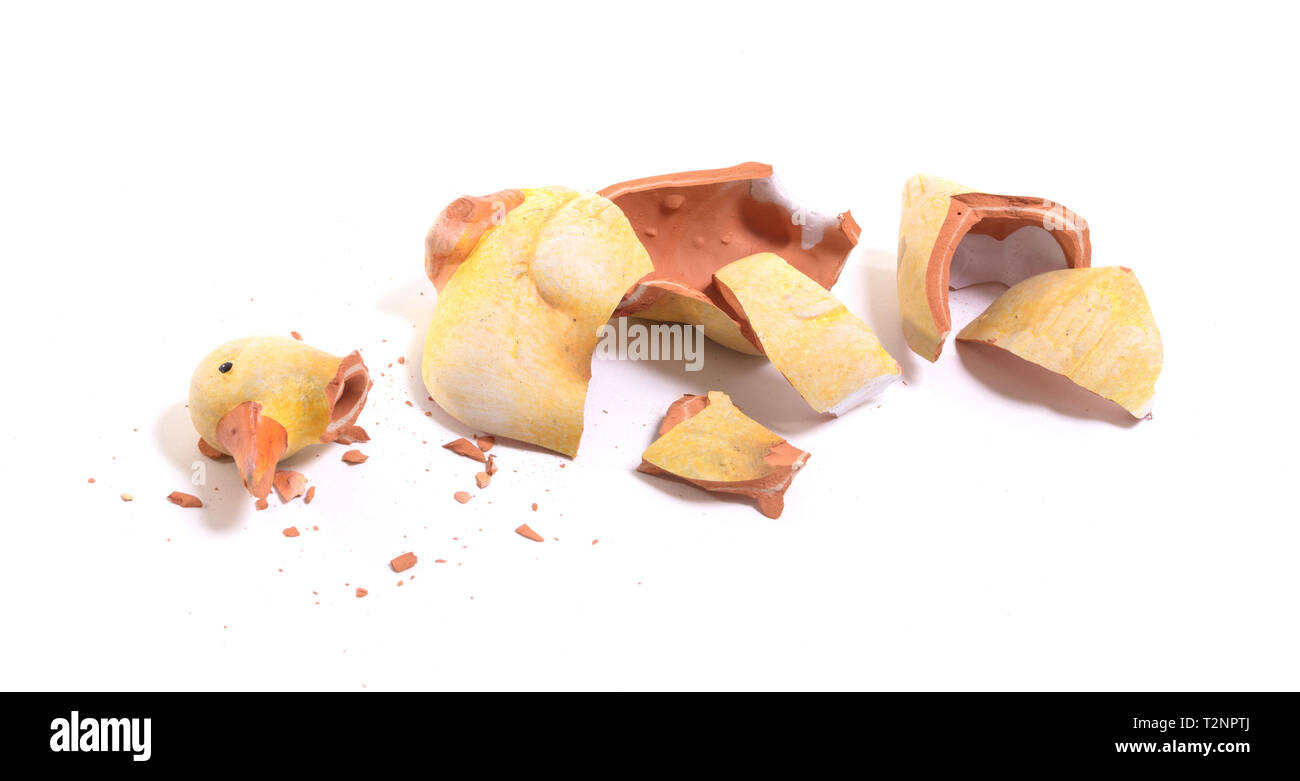 Broken statue of a duckling, isolated on white Stock Photo - Alamy