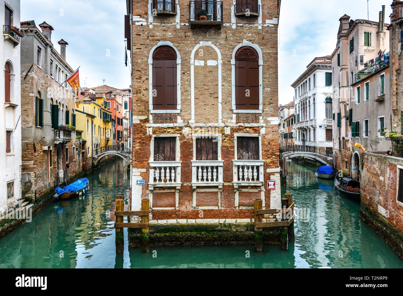 Canal in Venice with traditional old houses, Italy Stock Photo - Alamy
