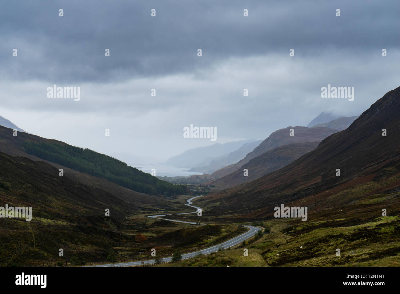 Mountain landscape with winding rural road, Achnasheen, Scottish ...
