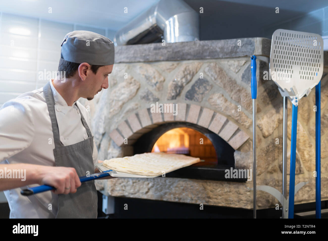 Fat man eating pizza hi-res stock photography and images - Alamy