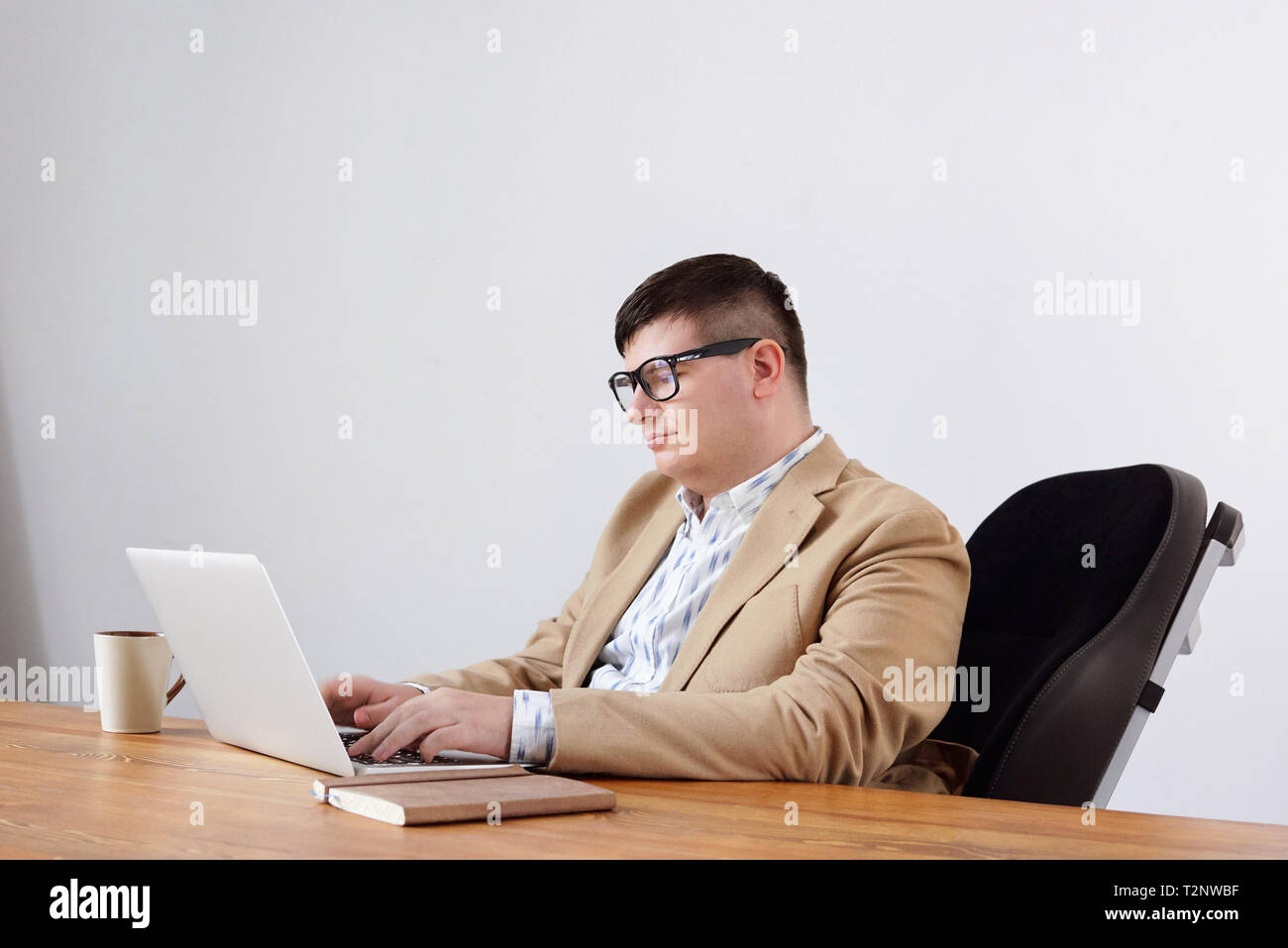 Man wearing jacket working on hi-res stock photography and images - Alamy