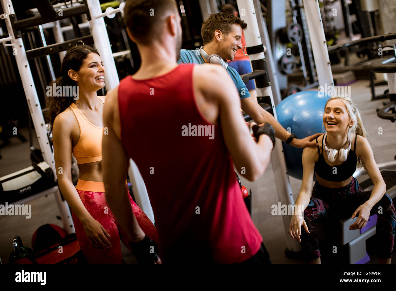 Group gym sitting laughing hi-res stock photography and images - Alamy