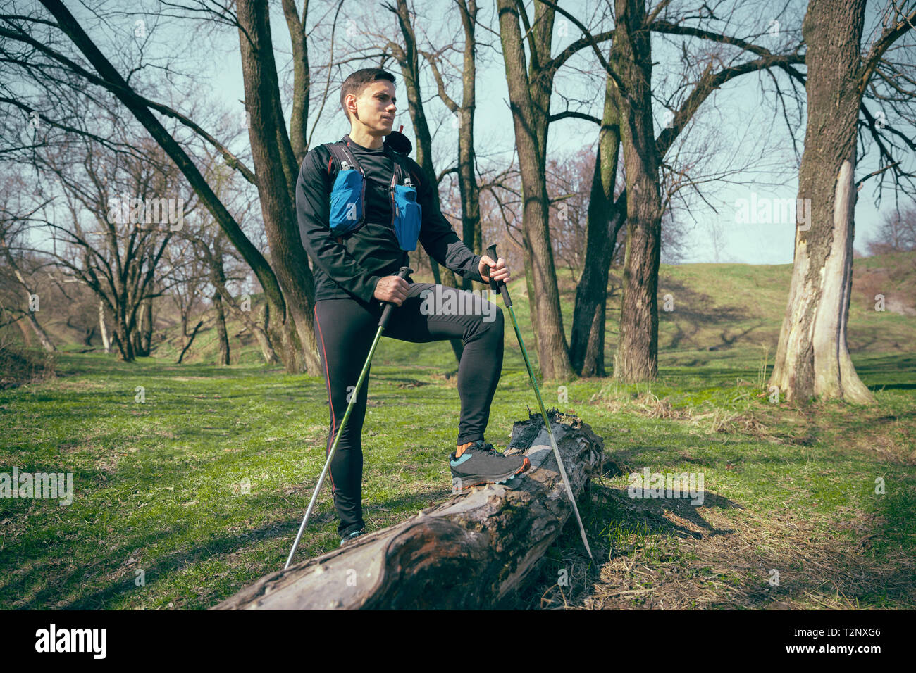 Hiker - man hiking in forest. Male fit athlete walking outdoors at nature. Healthy lifestyle ...