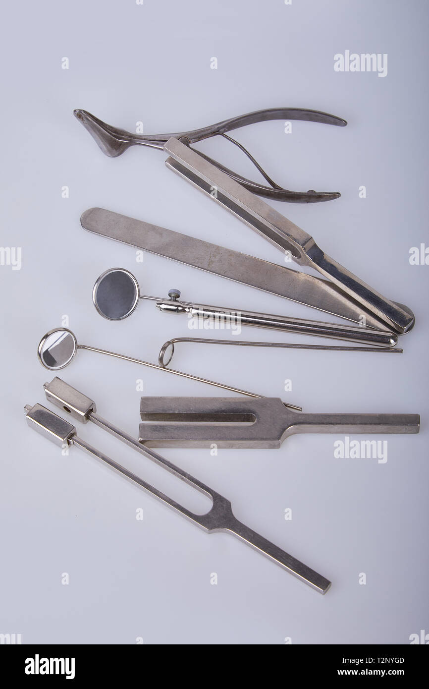 Medical instruments for ENT doctor on white. A set of Otolaryngologist ...