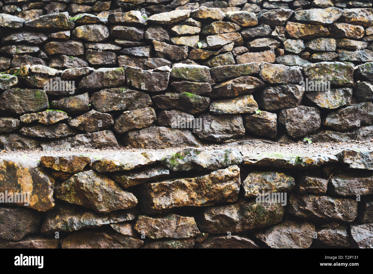 Stone old wall, Stone wall background natural , Rock Stock Photo - Alamy