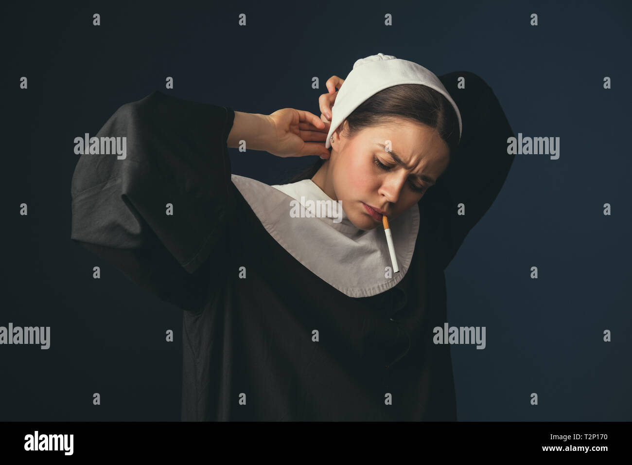 Nun smoking hi-res stock photography and images - Alamy