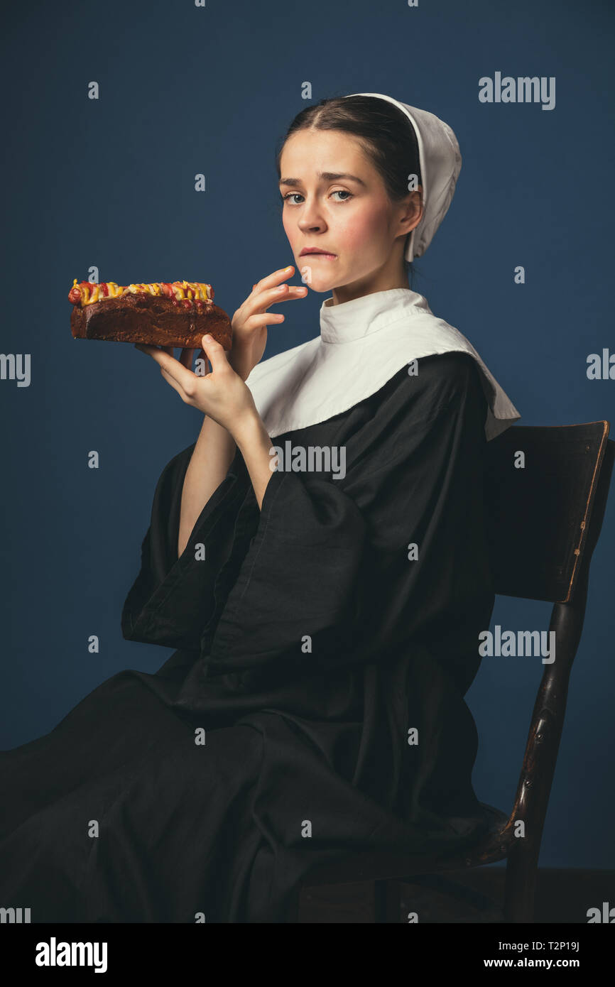 Young lady sitting on bonnet hi-res stock photography and images - Alamy