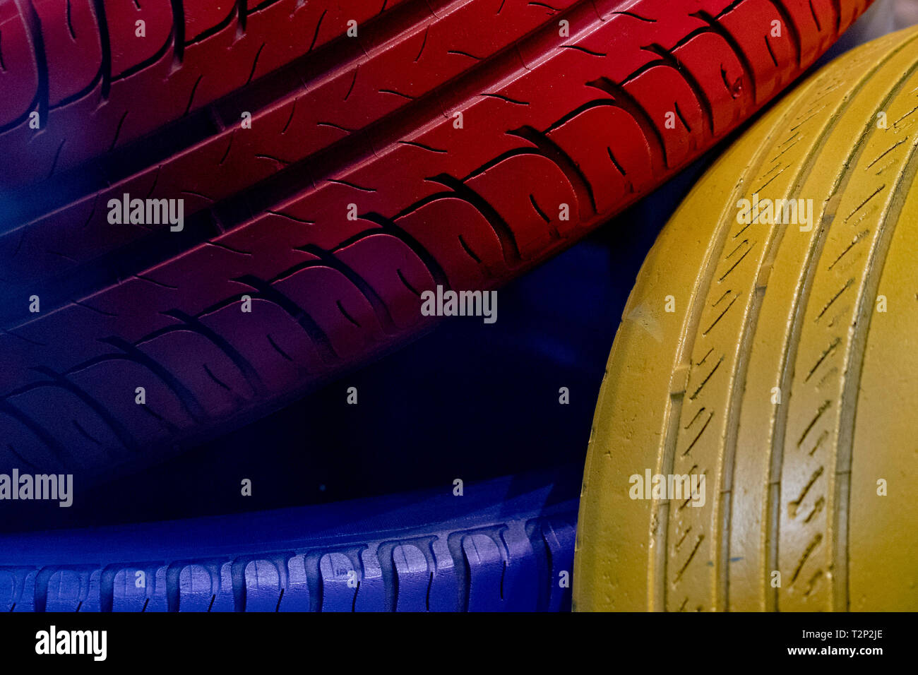 many colors car tires detail Stock Photo - Alamy