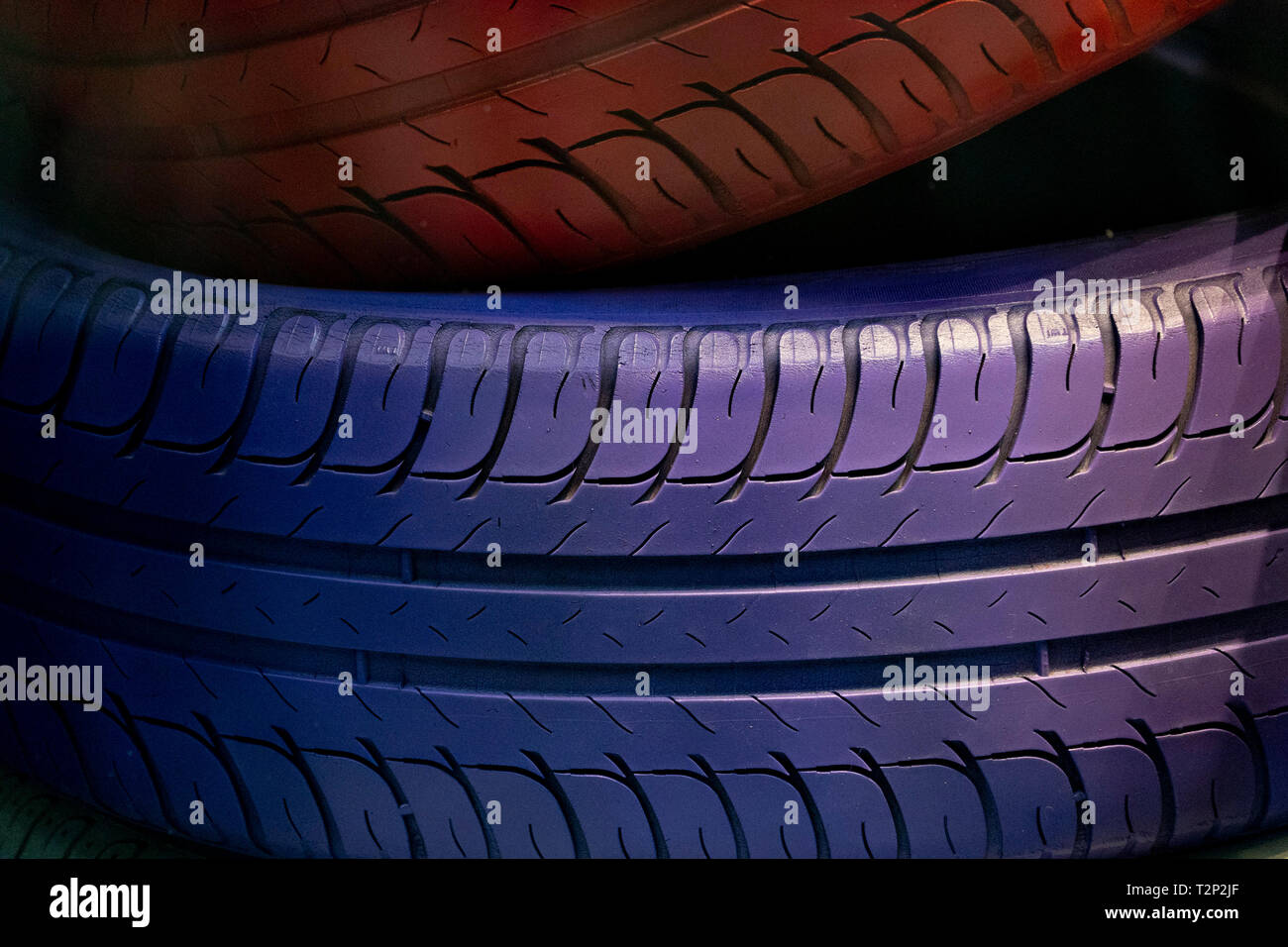 many colors car tires detail Stock Photo - Alamy