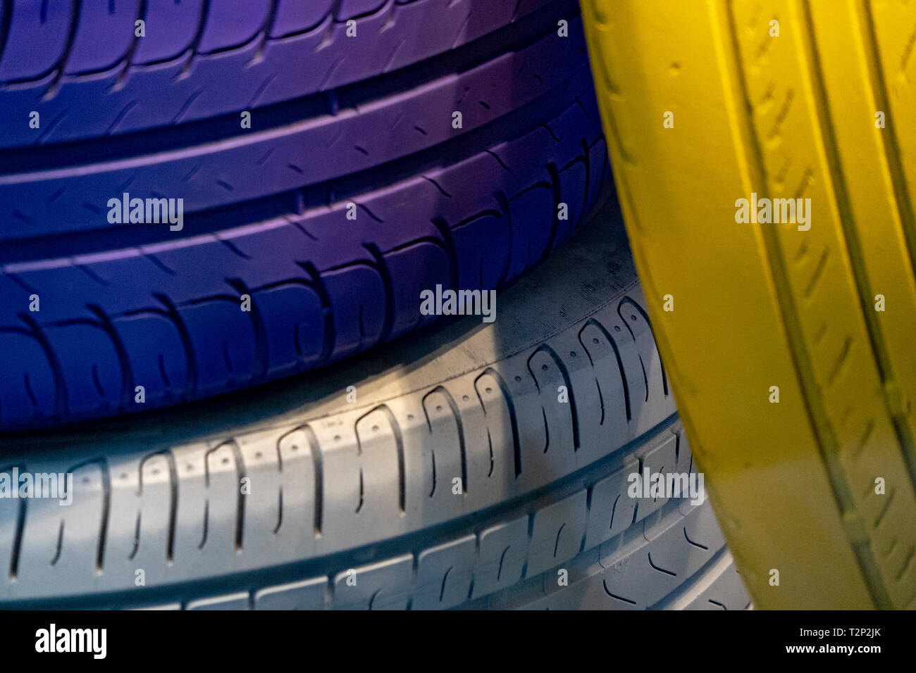many colors car tires detail Stock Photo - Alamy