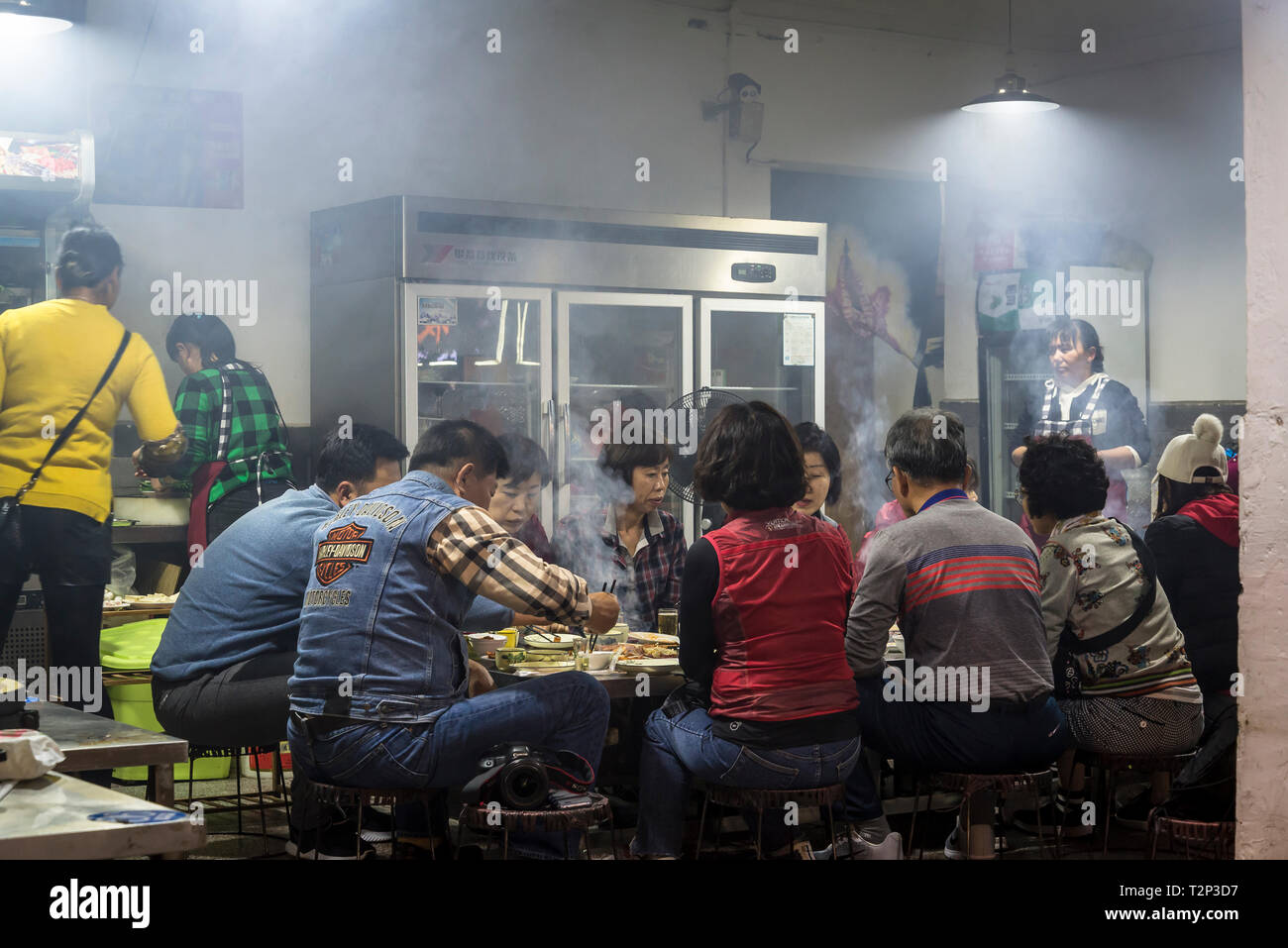 China group eating people hi-res stock photography and images - Alamy