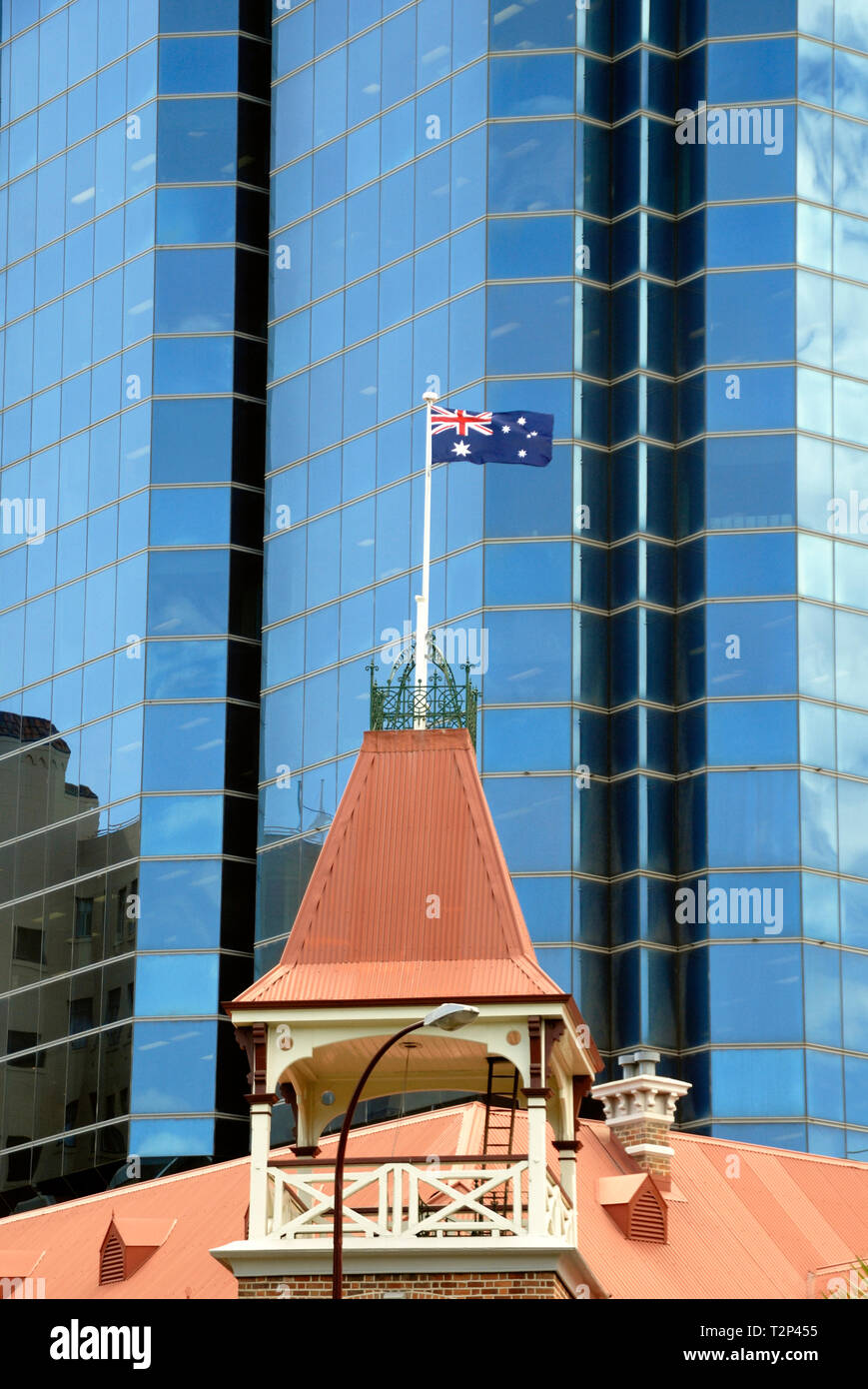 Australian flag flying on flagpole at the roof of an old fashioned ...