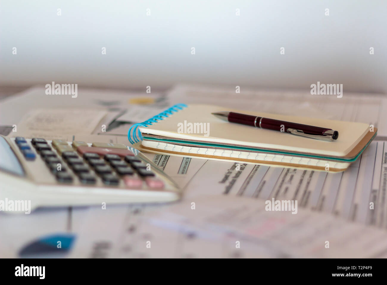 Desk with accounting paperwork Stock Photo - Alamy