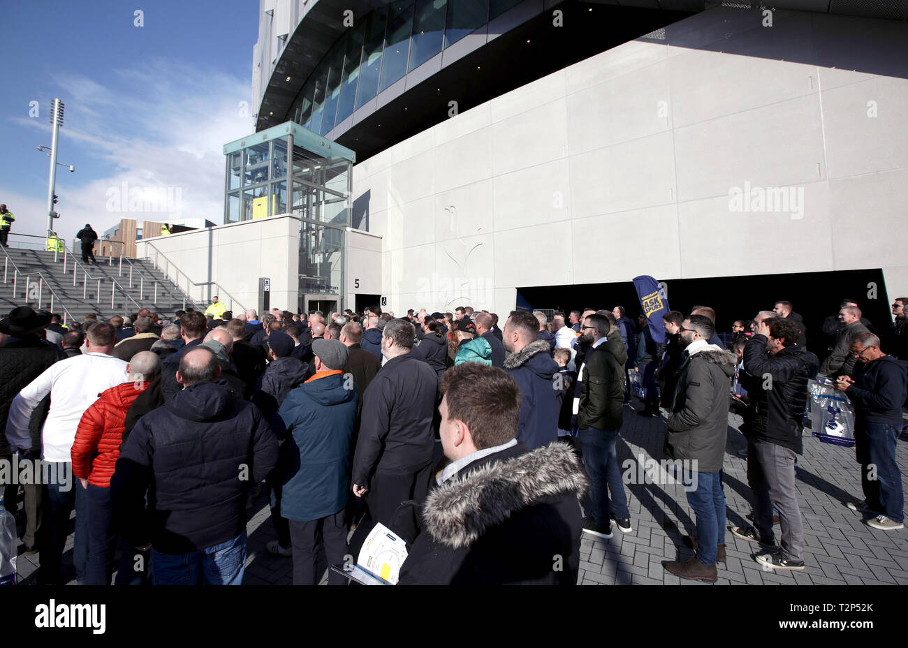 Fans arrive at The Tottenham Hotspur Stadium, London Stock Photo - Alamy