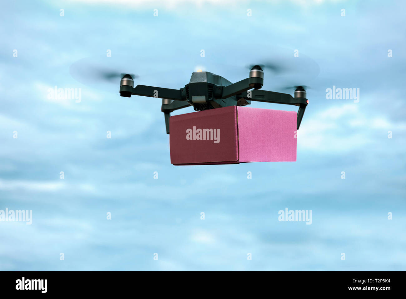 Drone carrying mail box for fast air delivery Stock Photo - Alamy