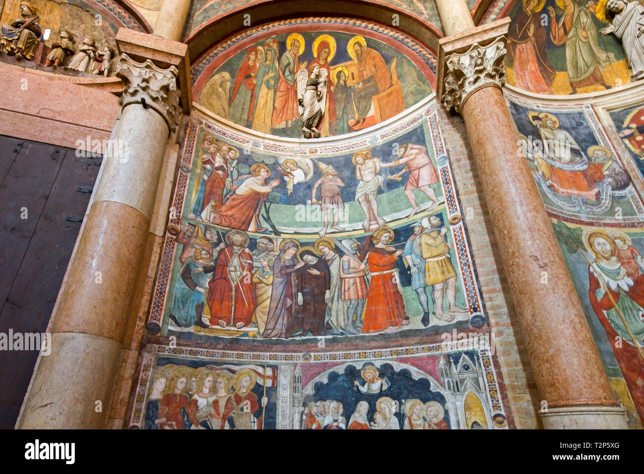 Inside the famous Baptistery of Parma richly decorated by frescoes and ...