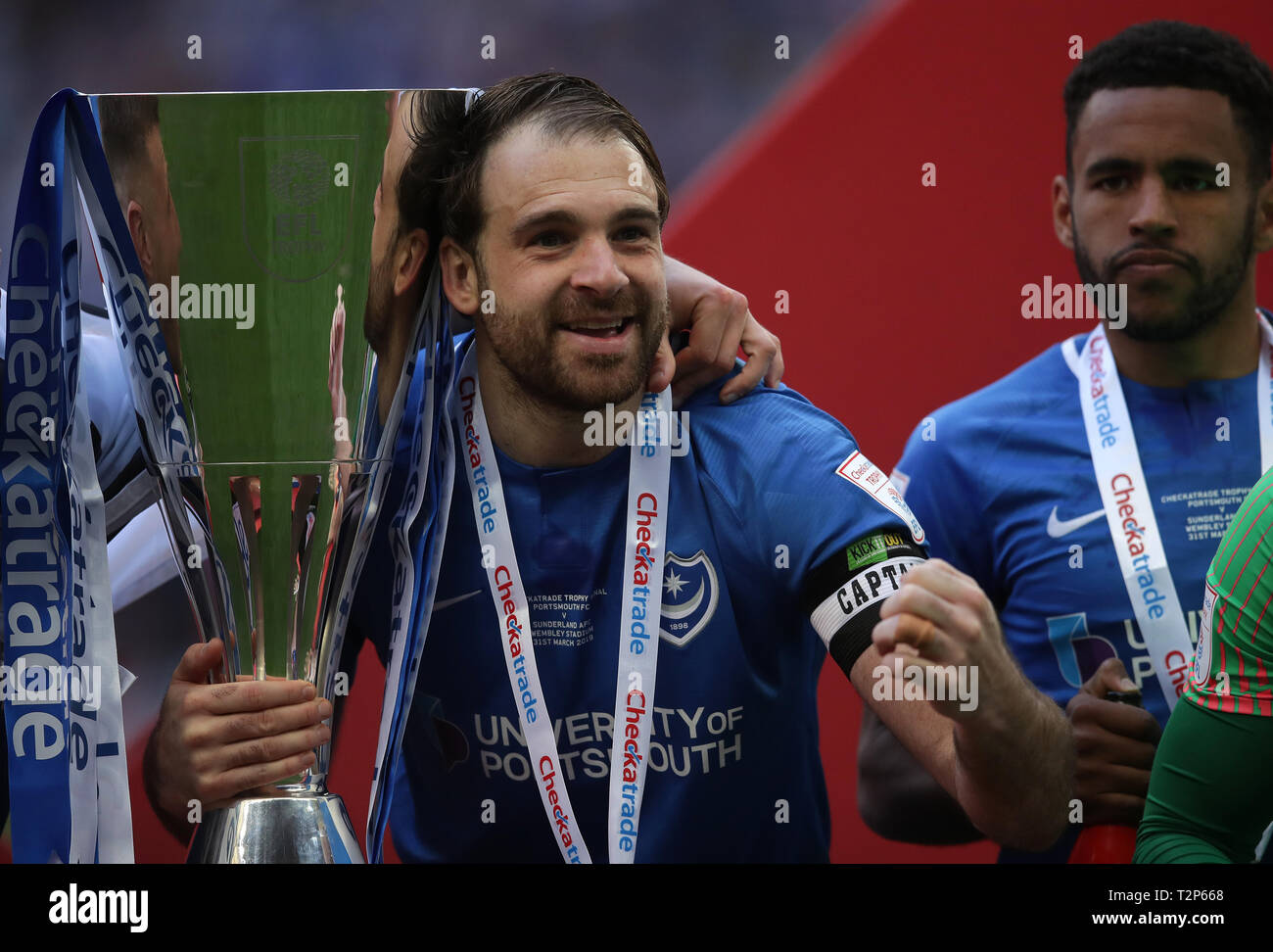 Portsmouth's Brett Pitman celebrates with the trophy during the ...
