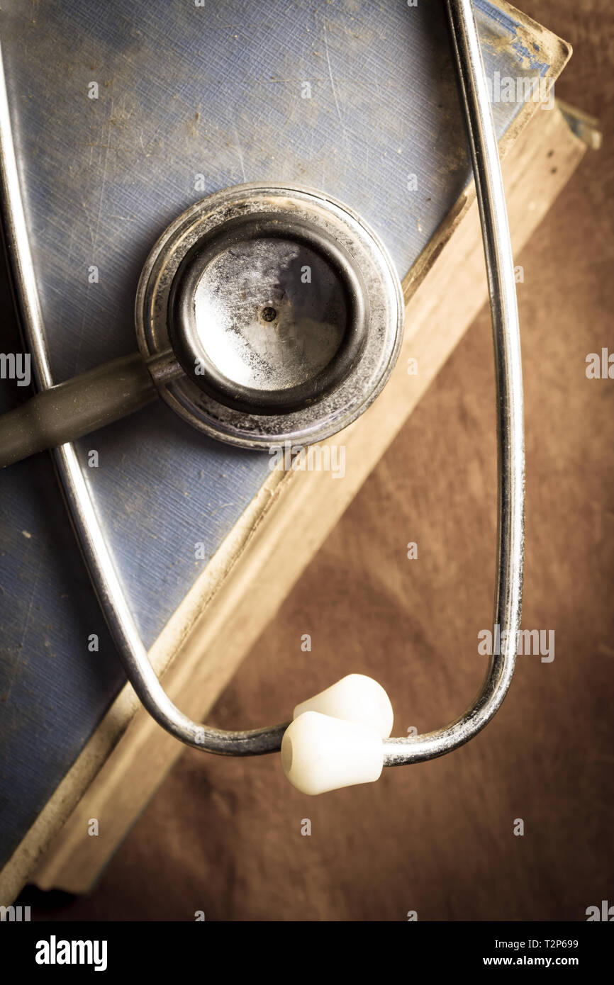 Stethoscope on antique book,vintage color style Stock Photo - Alamy
