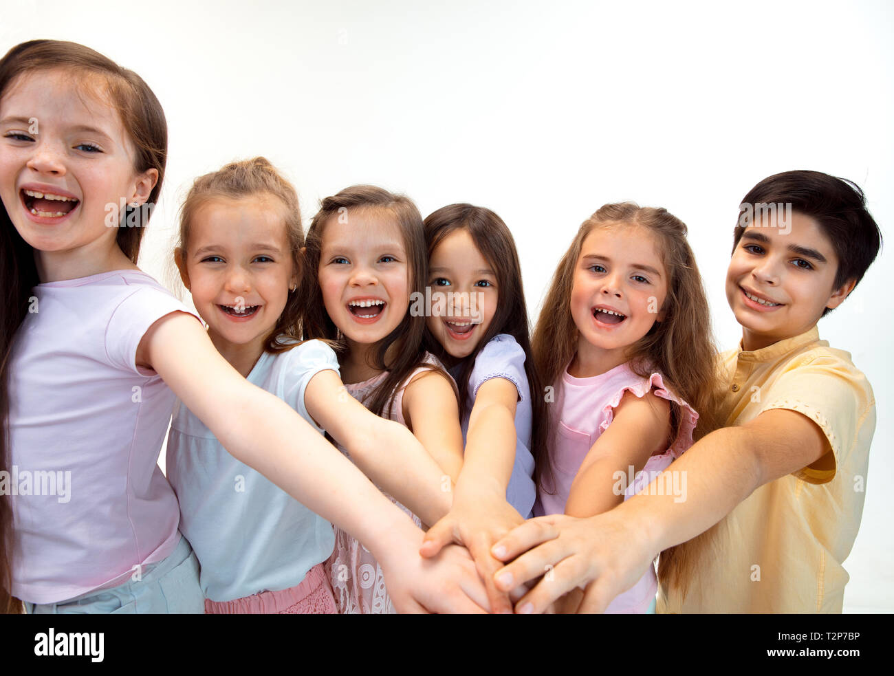 The portrait of happy cute little kids boy and girls in stylish casual ...