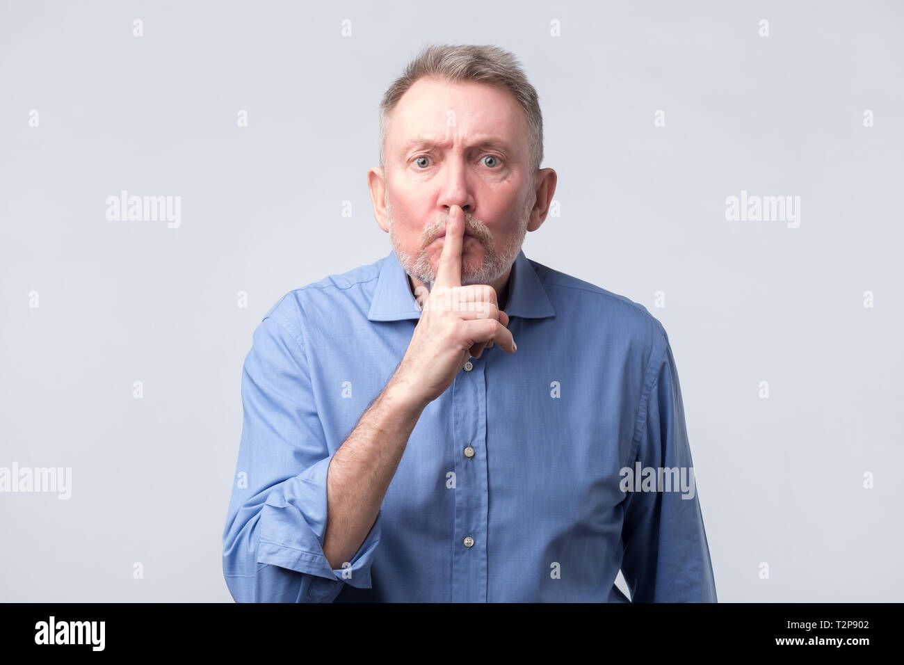 Making silence gesture hi-res stock photography and images - Alamy