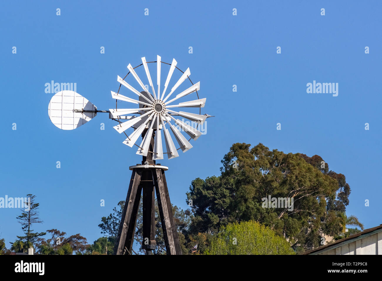 Old water pumping windmill, California Stock Photo - Alamy
