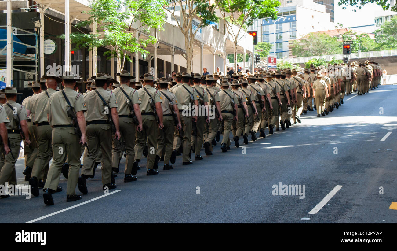 A large column of soliders marching in the Anzac Military Parade ...