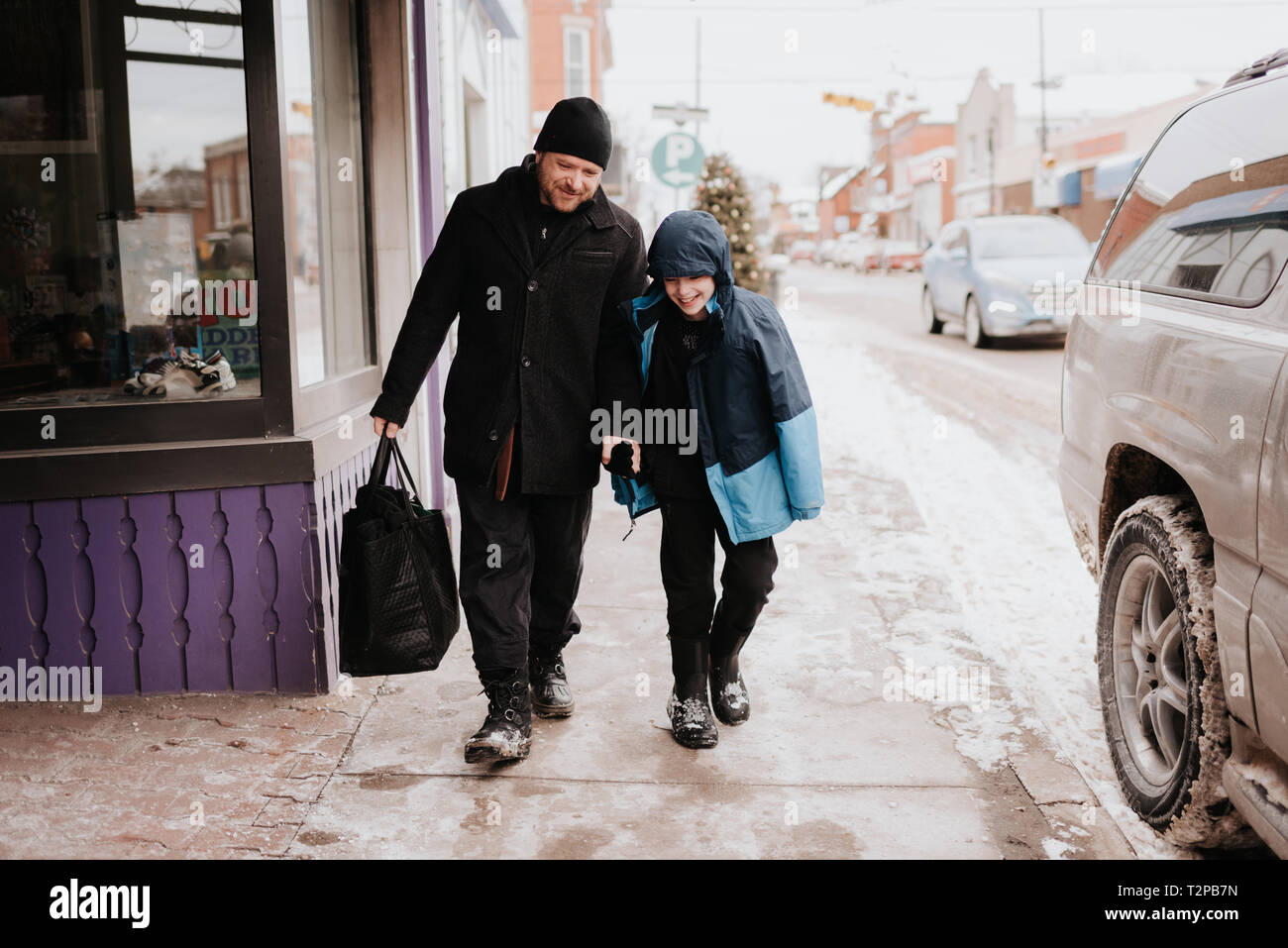 Boy walking past hi-res stock photography and images - Alamy