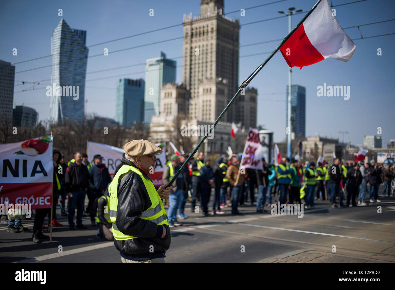 A farmer seen waving a Polish flag during the protest. AGROUNIA union ...