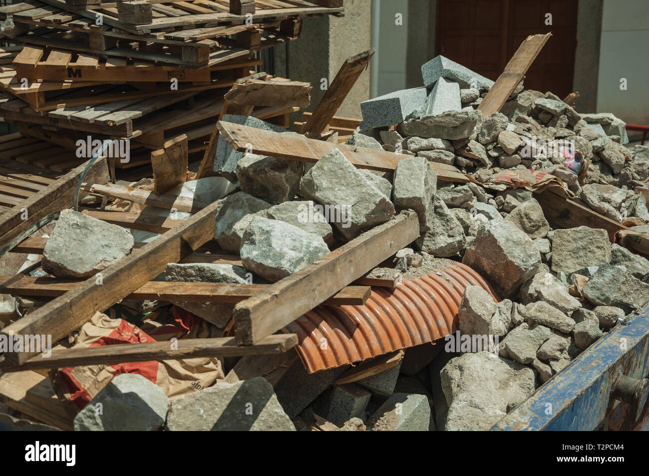 Pile of building rubble in a construction site of street being ...