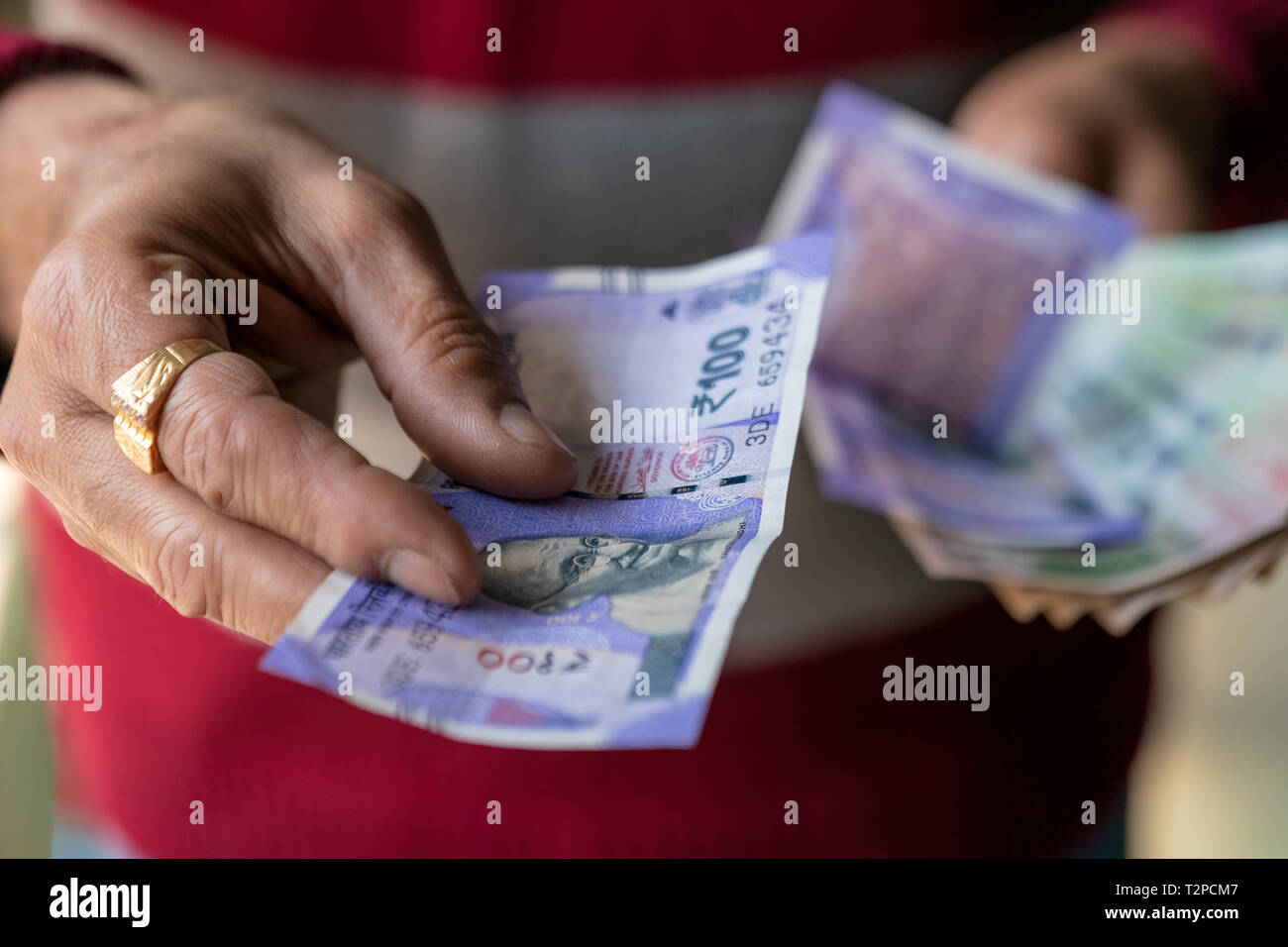 One hundred rupees hi-res stock photography and images - Alamy